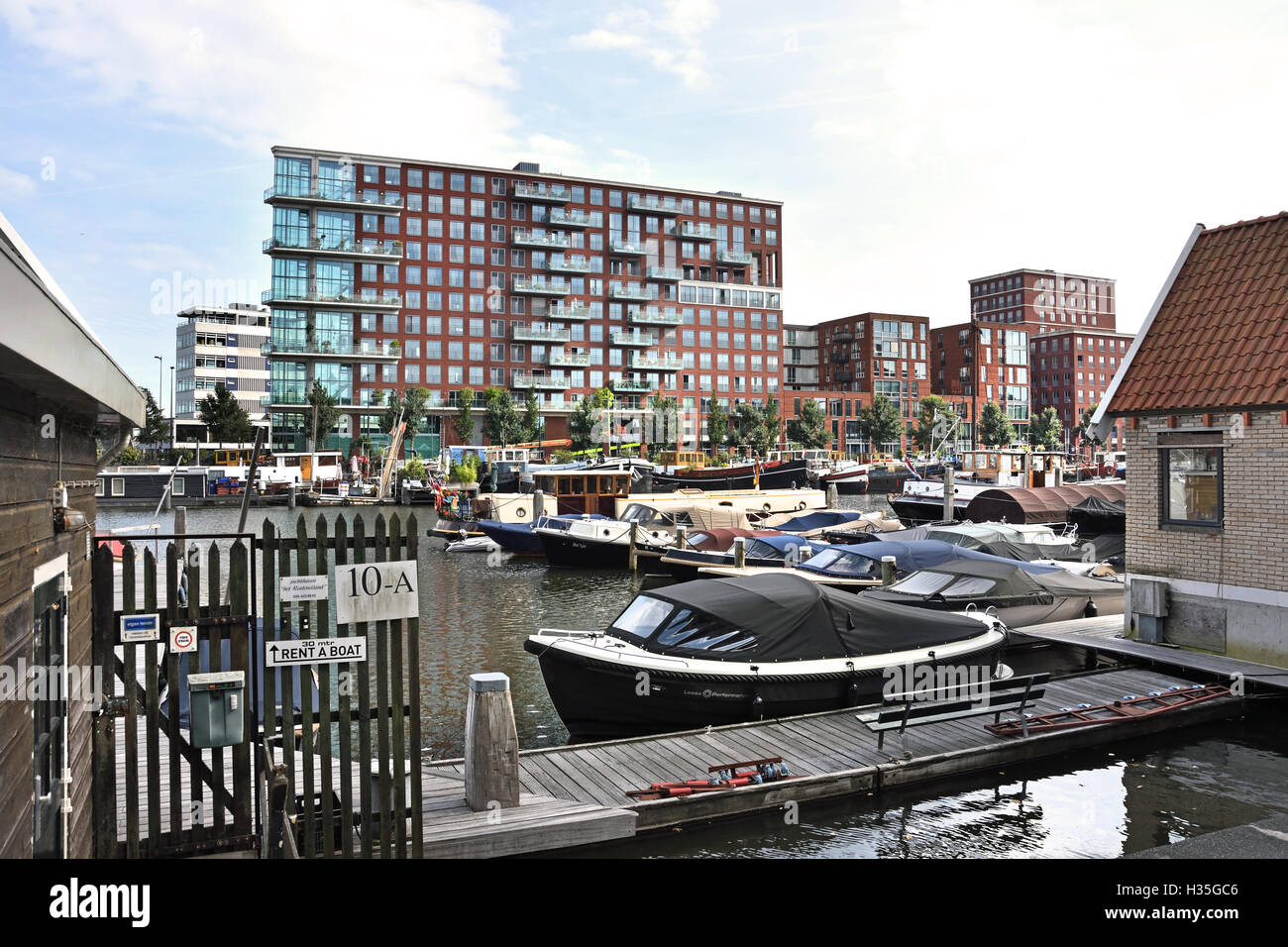 Westerdok Amsterdam Netherlands Dutch modern city town house boat houseboat Stock Photo - Alamy
