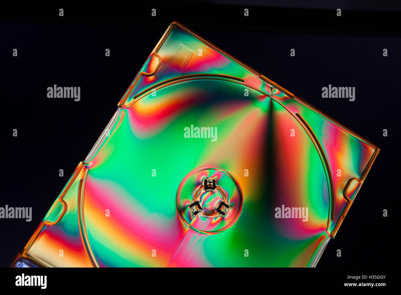 Birefringent plastic CD case Stock Photo - Alamy