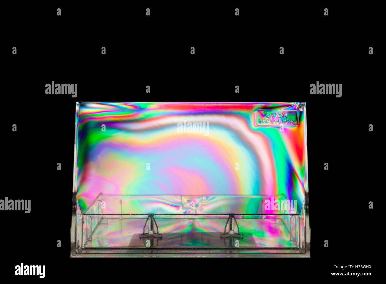 Birefringent plastic cassette box Stock Photo - Alamy