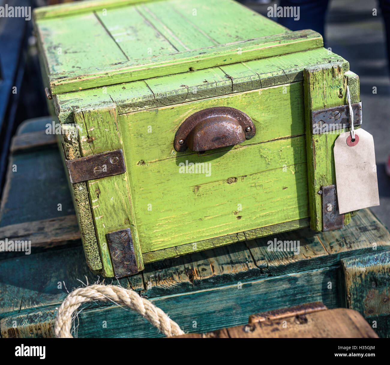 Retro wooden boxes for sale at a flea market Stock Photo - Alamy