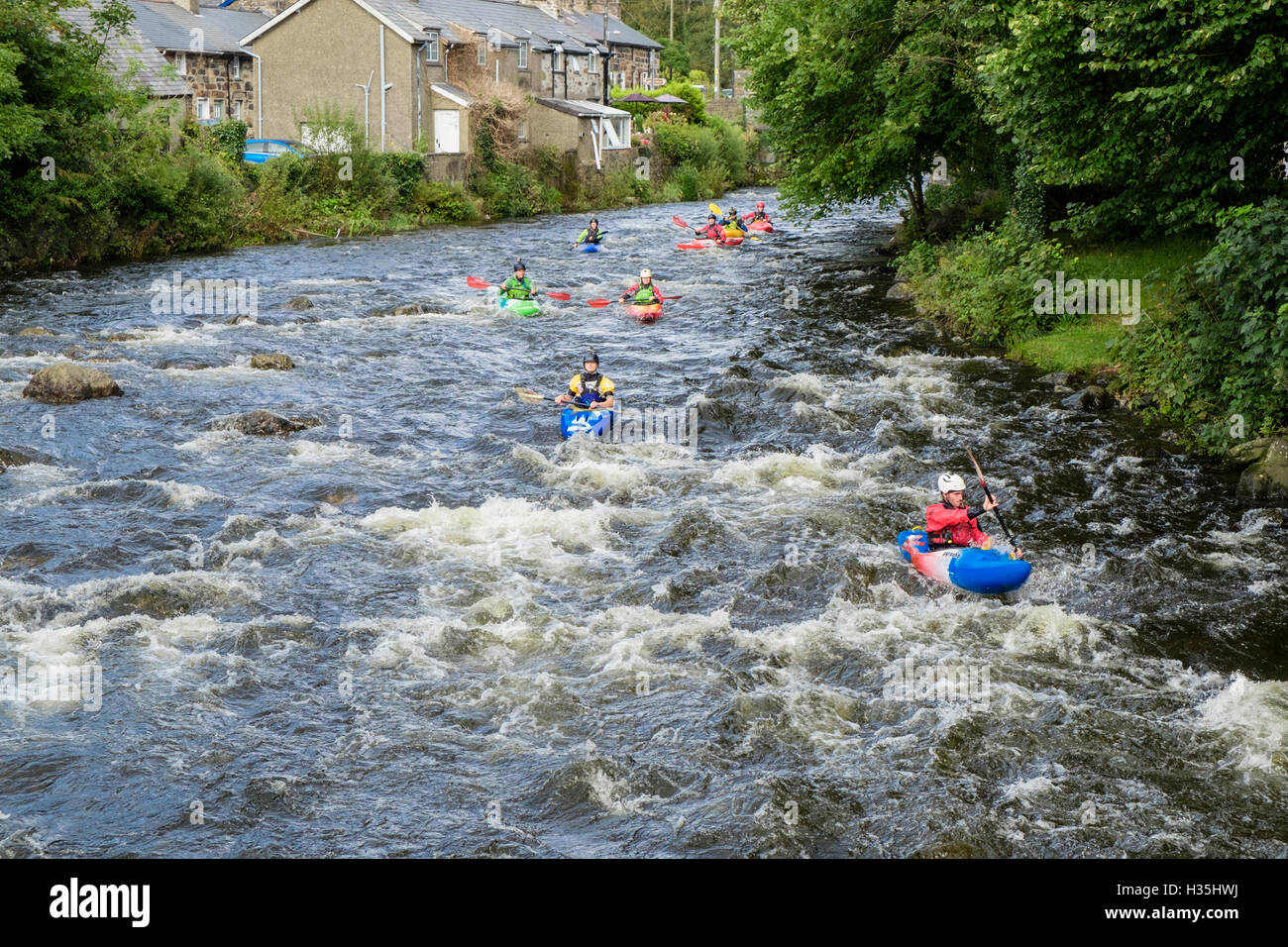 Group people kayaking down river hi-res stock photography and images ...