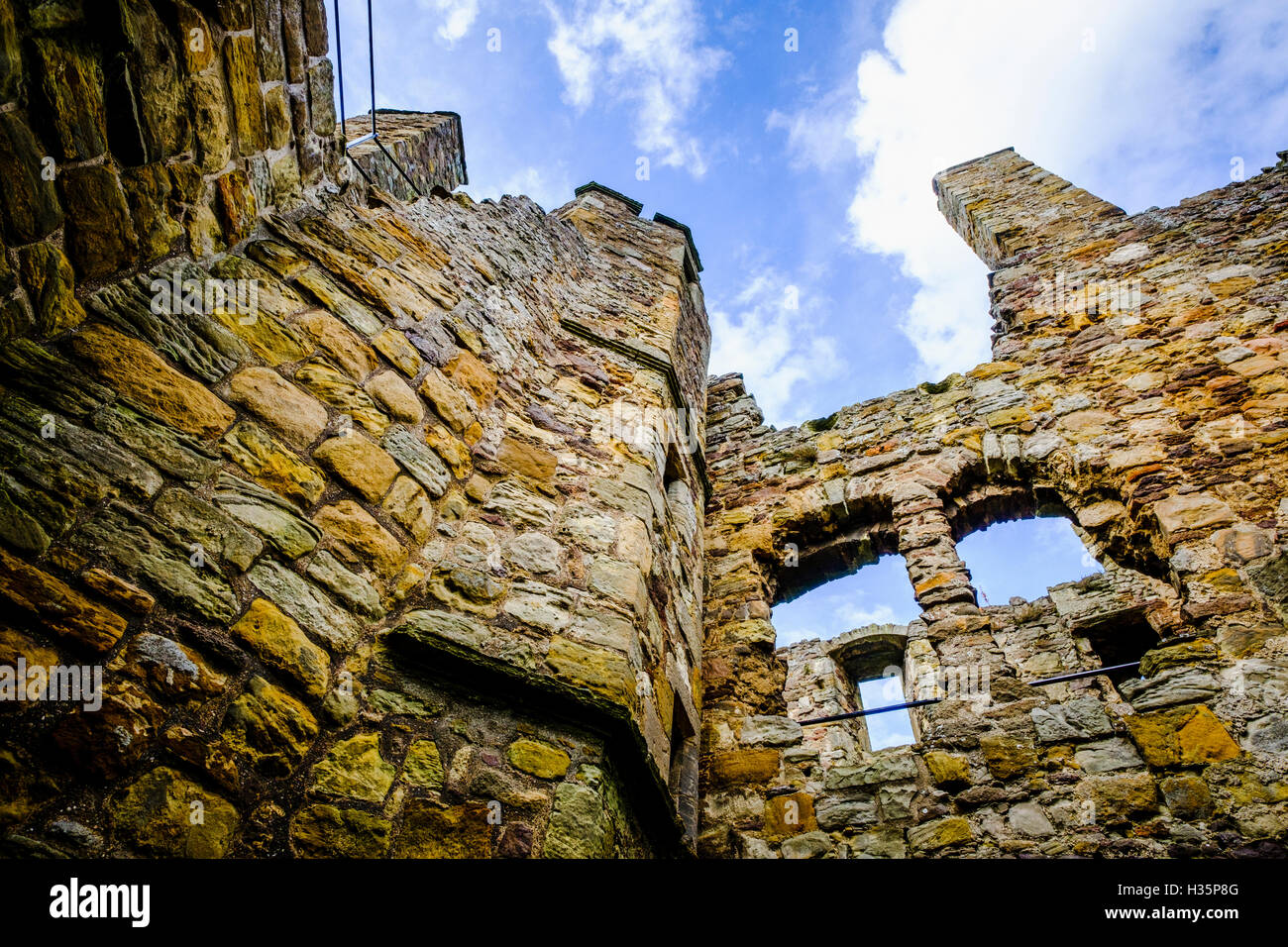Dirleton Castle, a ruined medieval fortress in the village of Dirleton ...