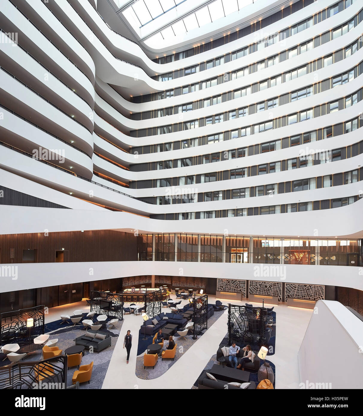 Atrium viewed from first floor circulation space. Hilton Amsterdam ...