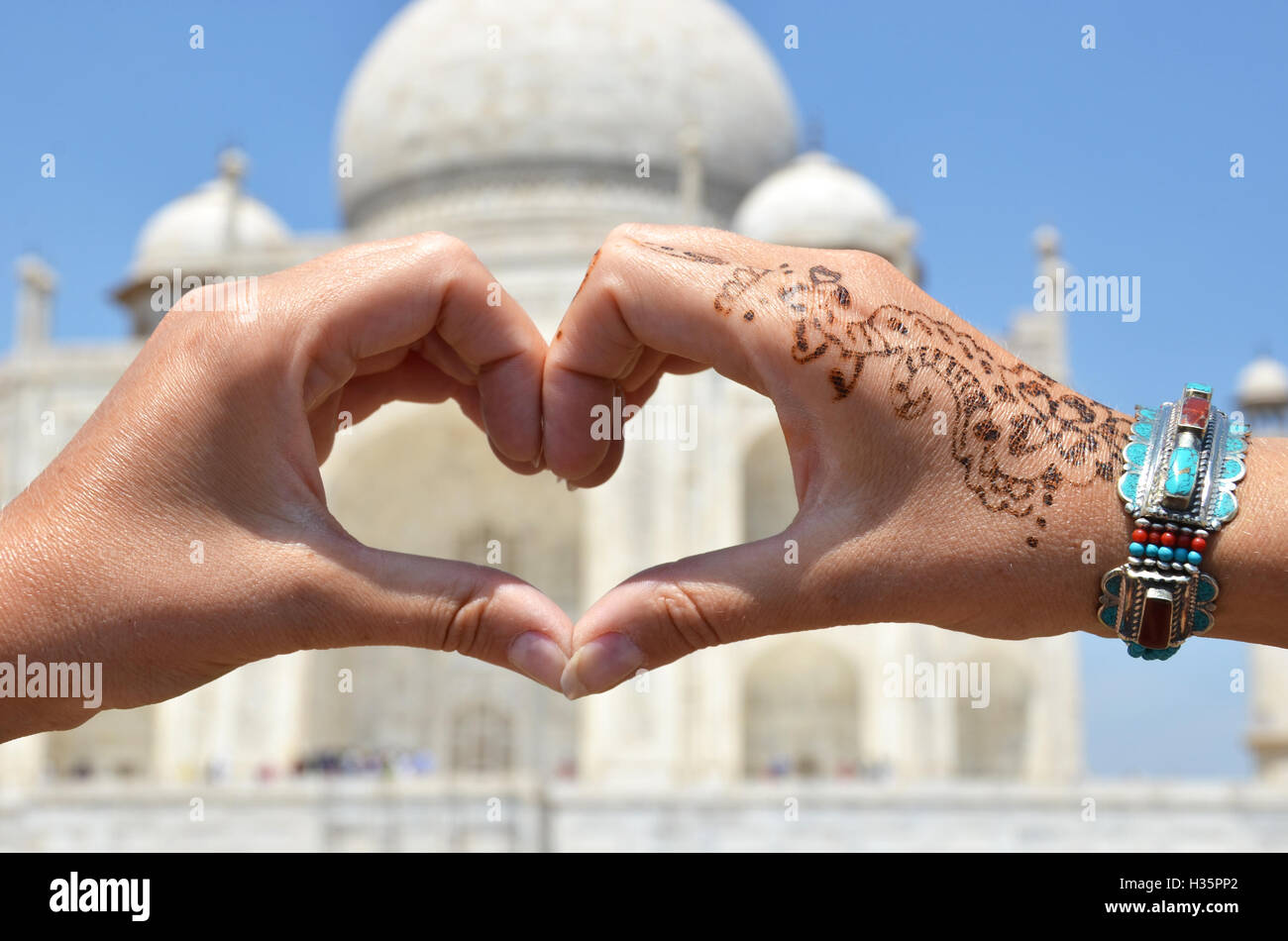 Heart-shaped hands against Taj Mahal. Agra, India Stock Photo - Alamy