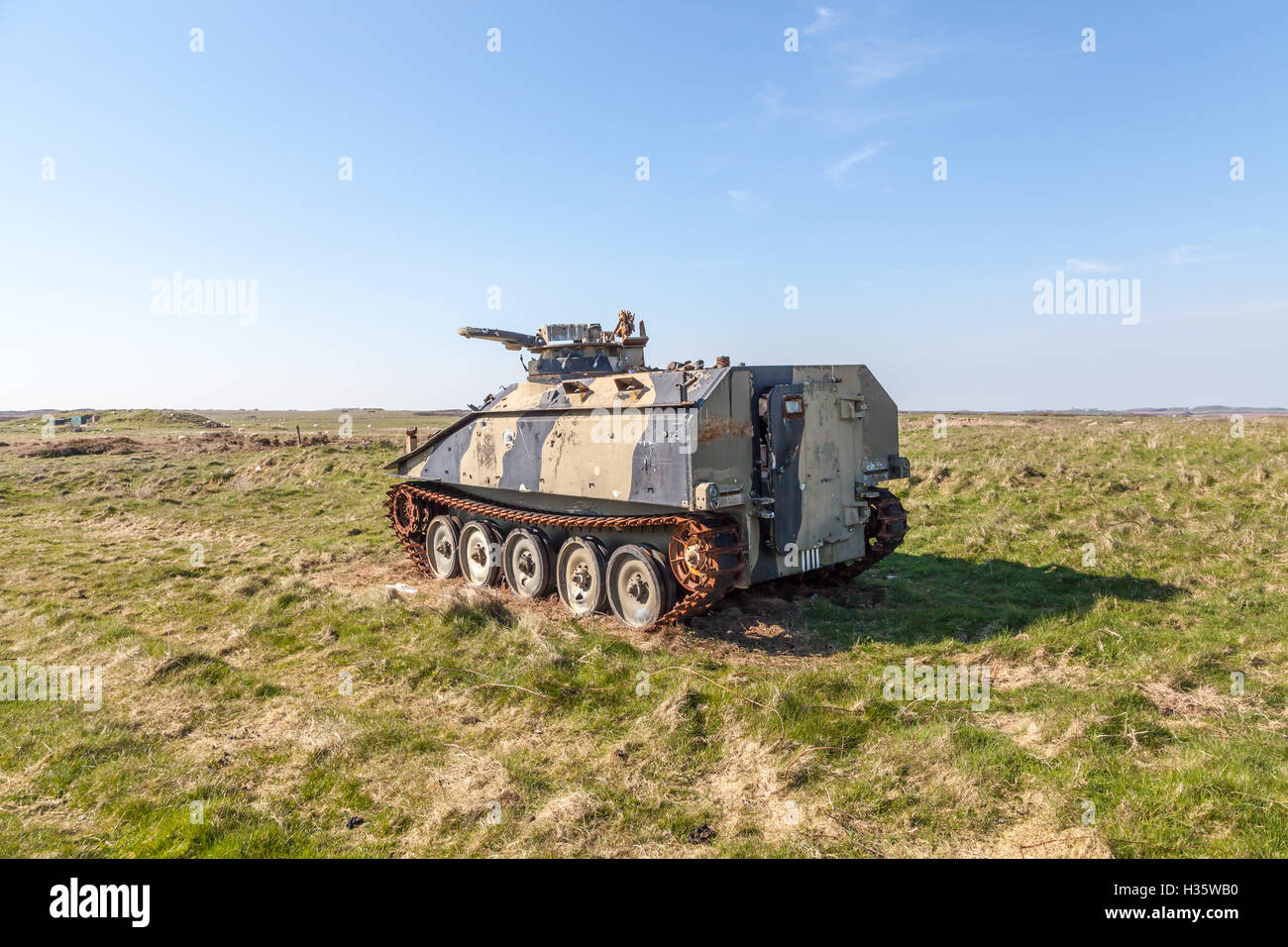 Old armored vehicle used for target practice on the Castlemartin Range ...