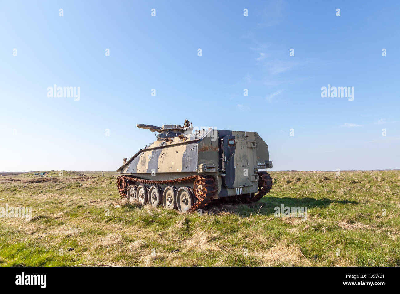 Old armored vehicle used for target practice on the Castlemartin Range ...
