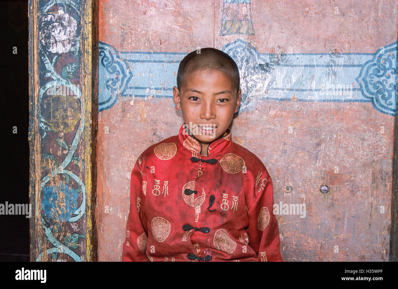 Young novice monk at Namkha Khyung Zong Buddhist monastery. This ...