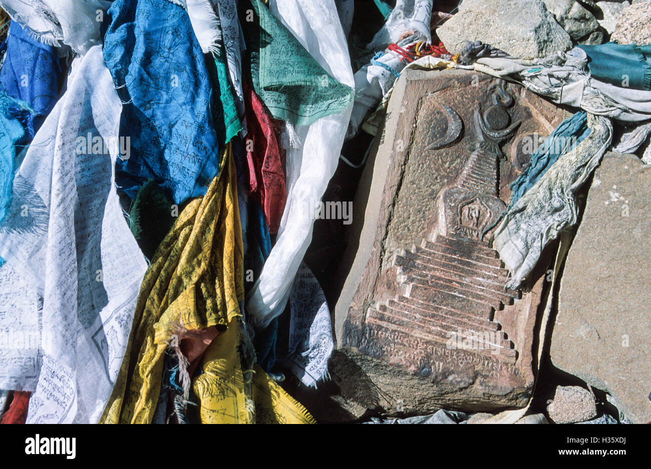 Detailed carved Buddhist gompa on this stone slab at this mani stone ...