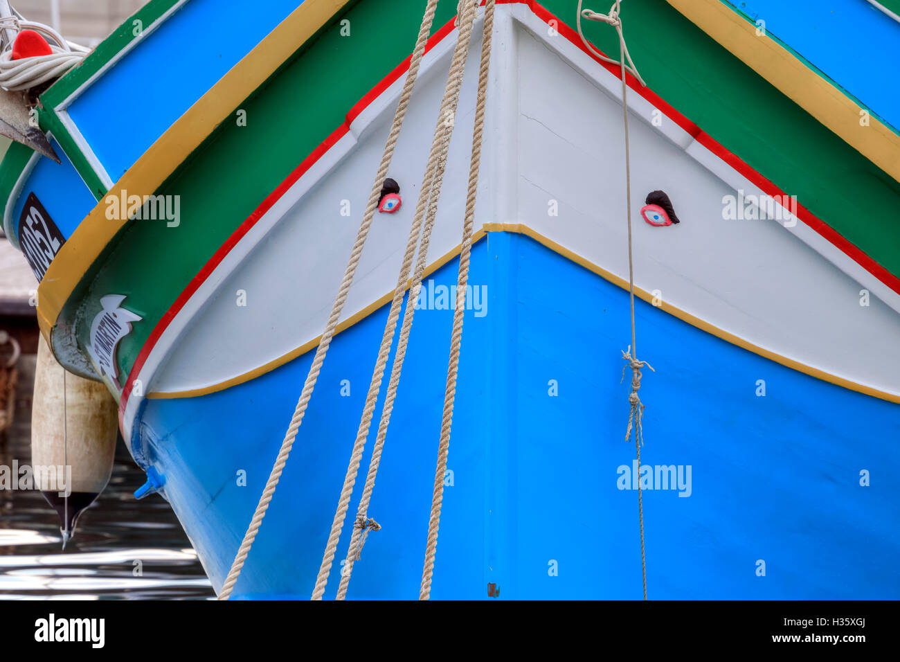 Bow of traditional Maltese fishing boat called Luzzu, with the Eye of ...
