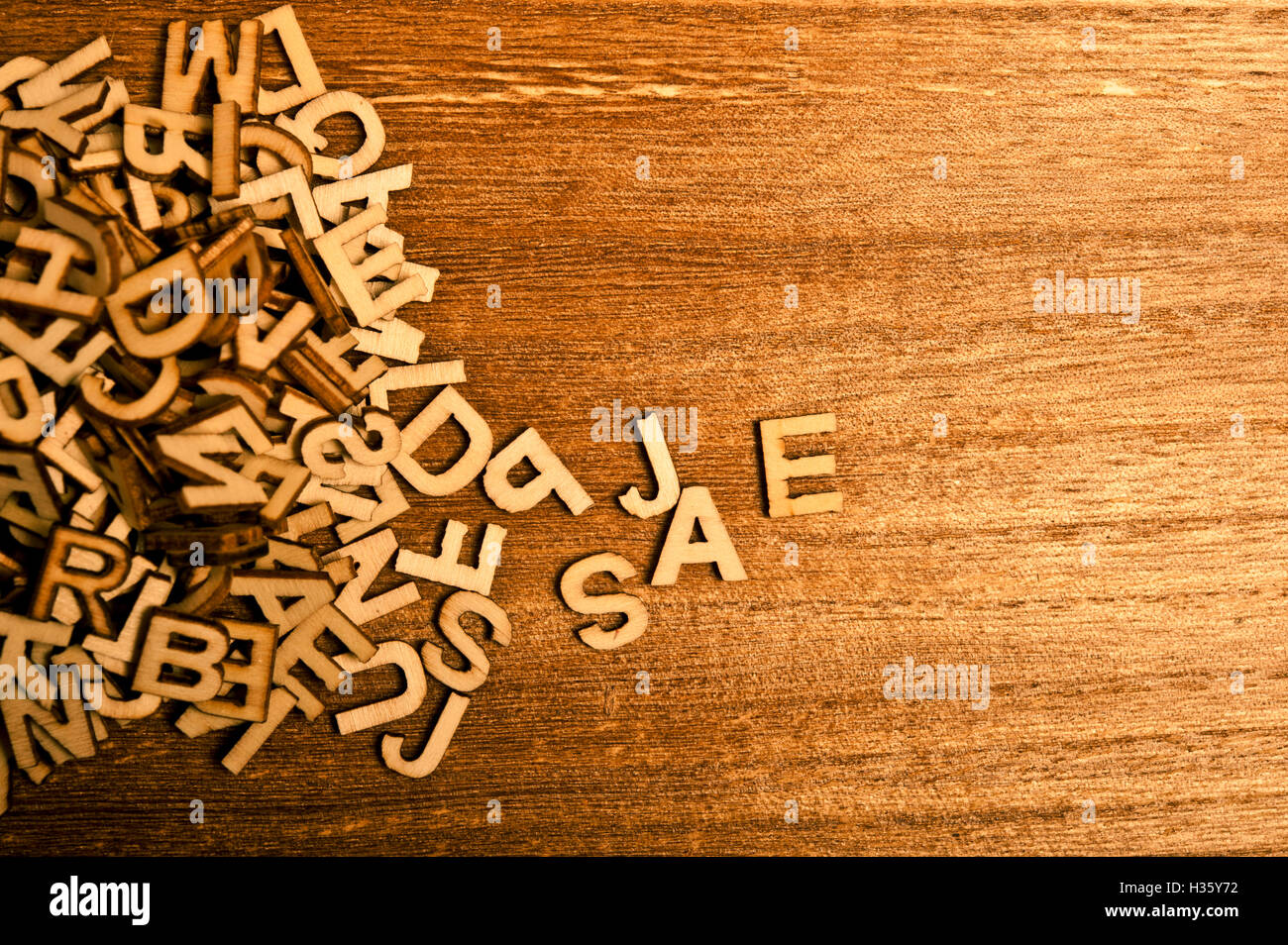 wooden letters scattered Stock Photo - Alamy