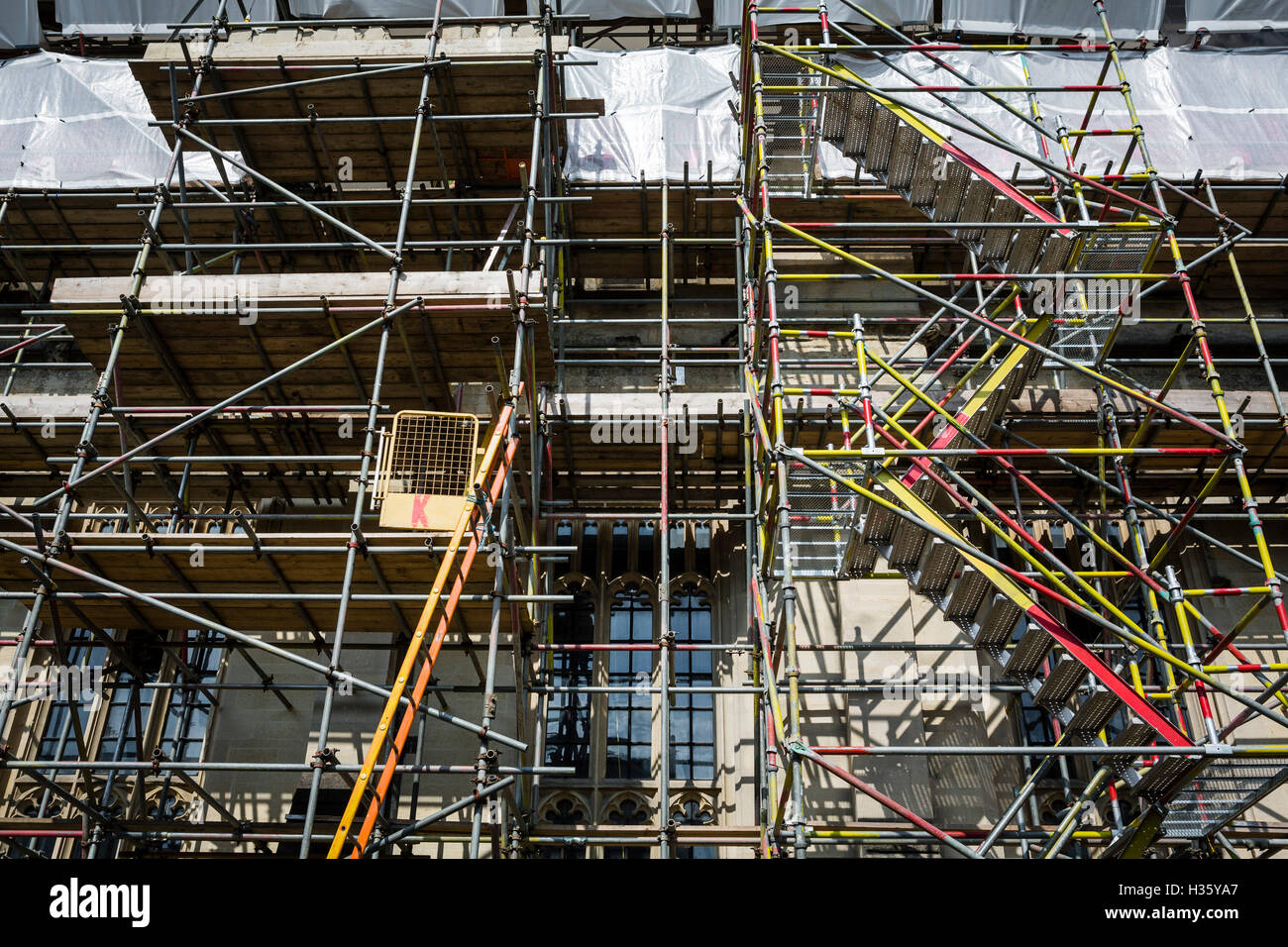 Large scaffolding structure on the outside of an old Oxford college ...