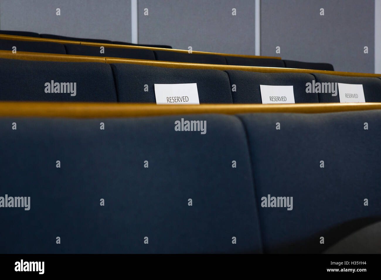 A lecture theatre with reserved signs on some of the seats Stock Photo ...