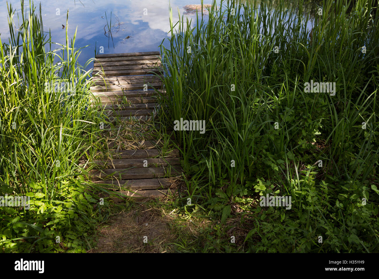 Simple wooden jetty hi-res stock photography and images - Alamy