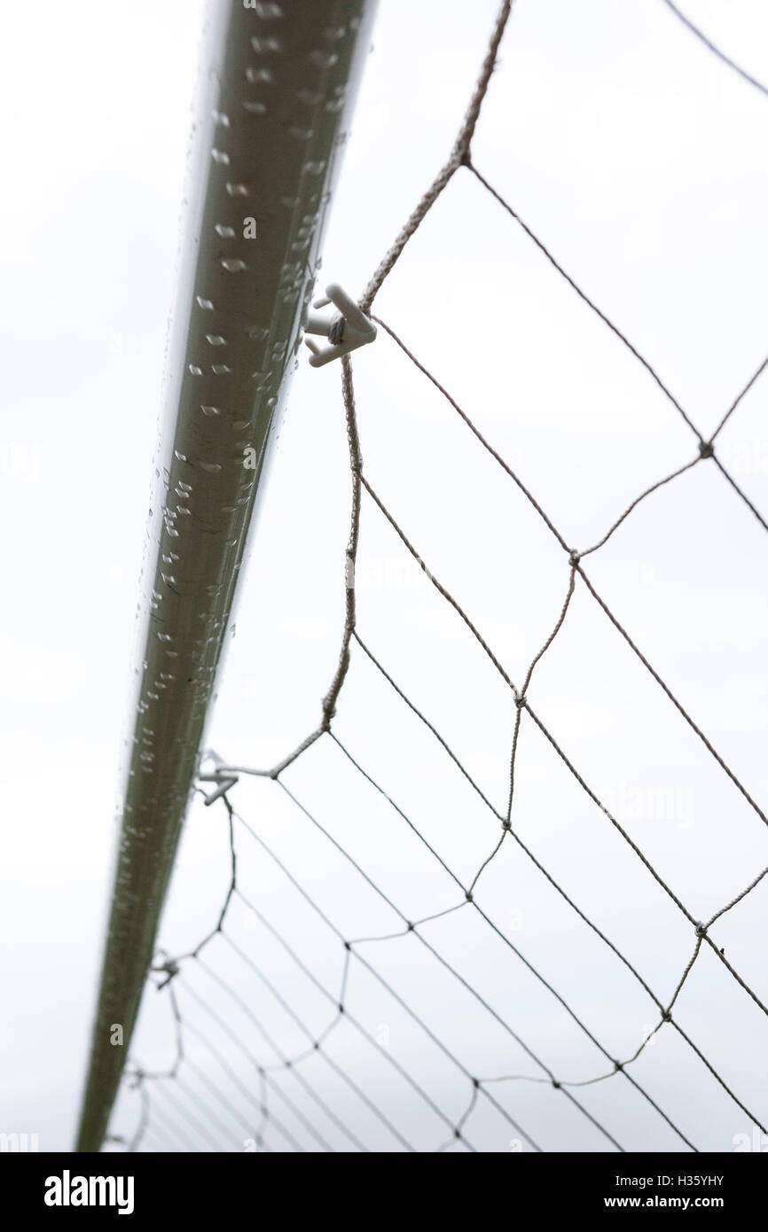 Football goal posts, croos bar and netting Stock Photo - Alamy