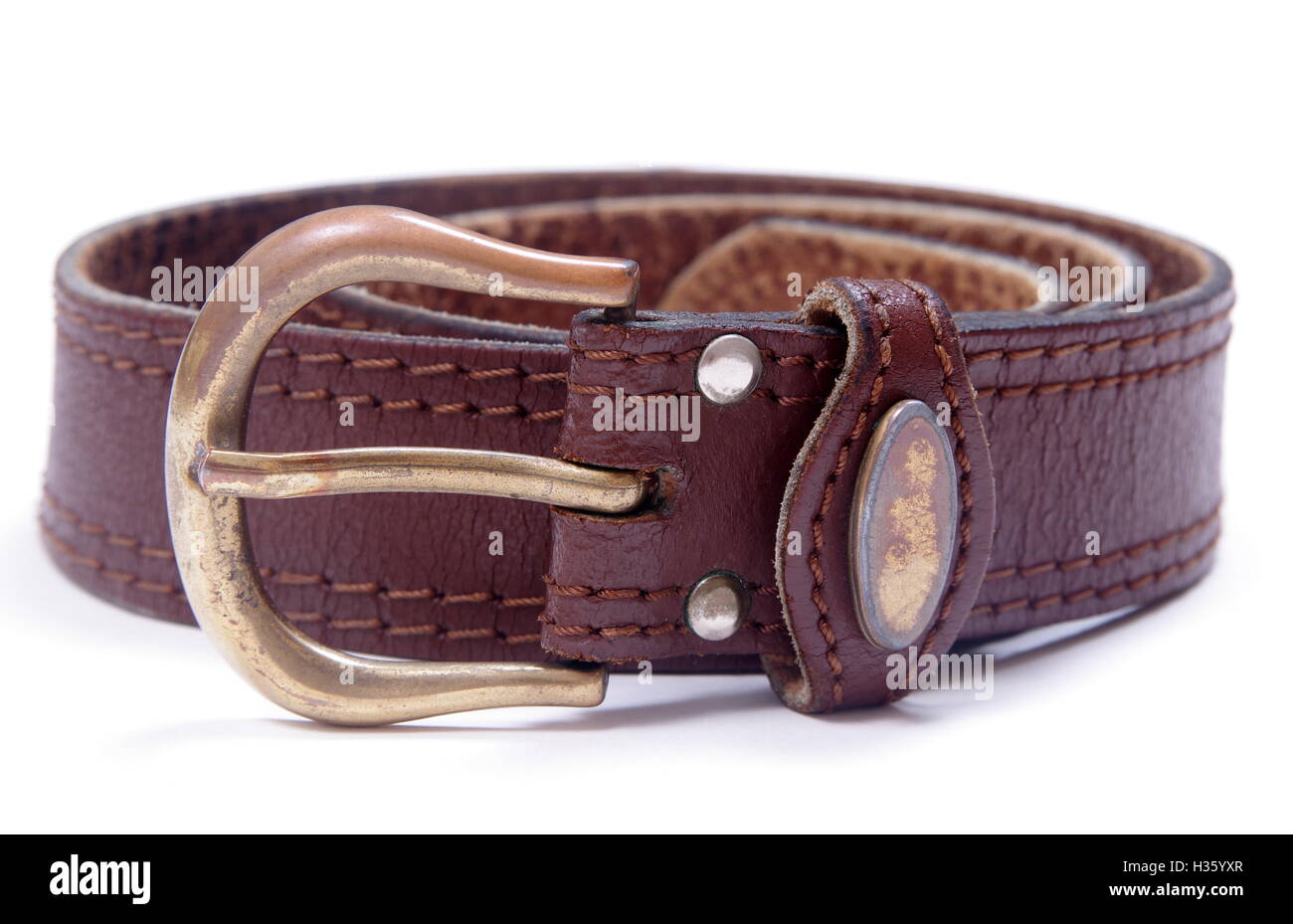 old vintage leather belt on white Stock Photo - Alamy