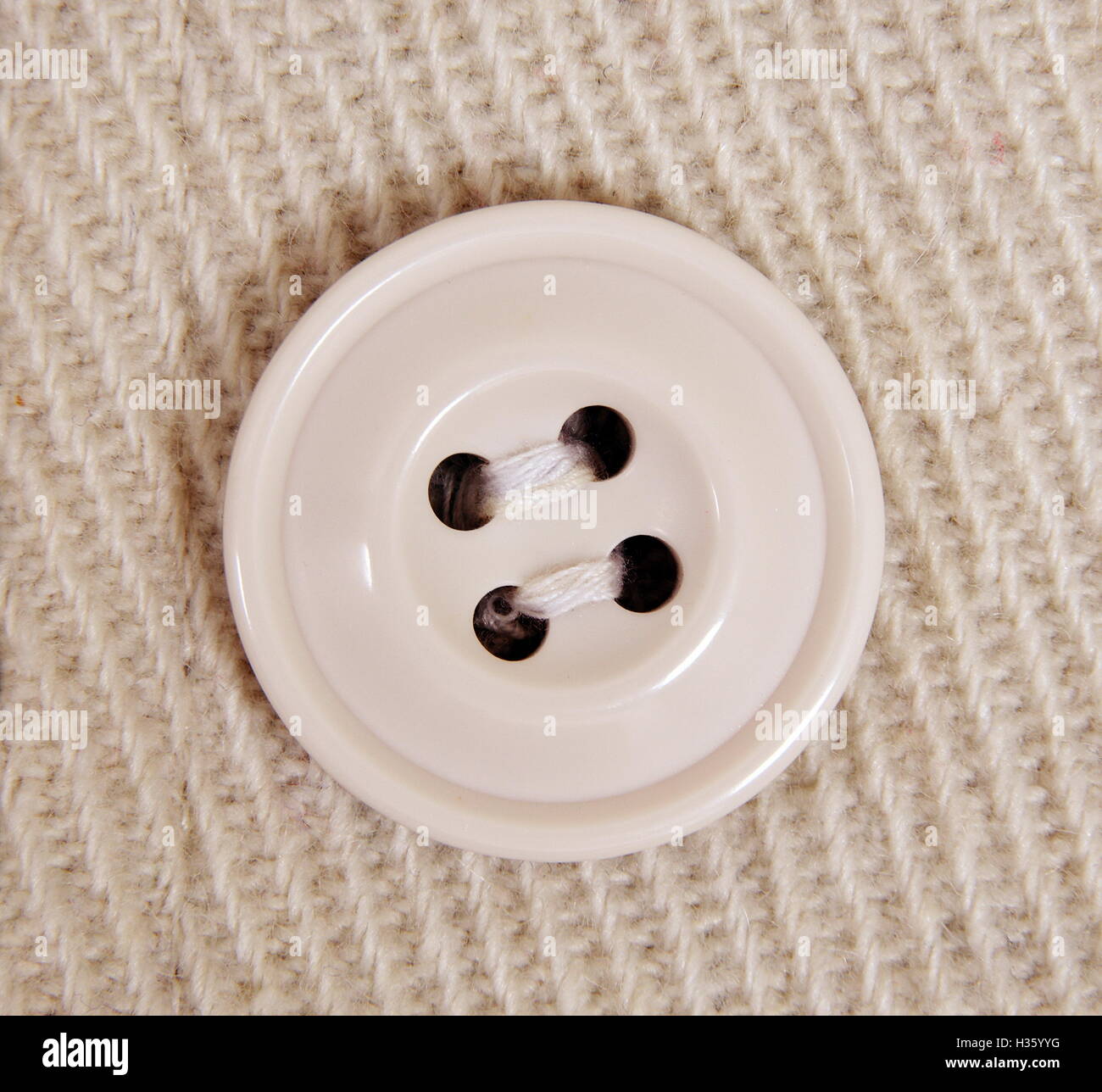button on the white coat Stock Photo - Alamy