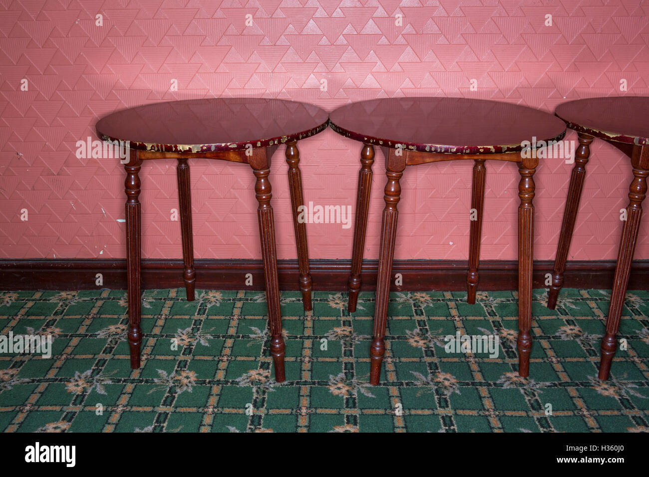 Interior fixtures and fittings of an old club house with dated worn ...