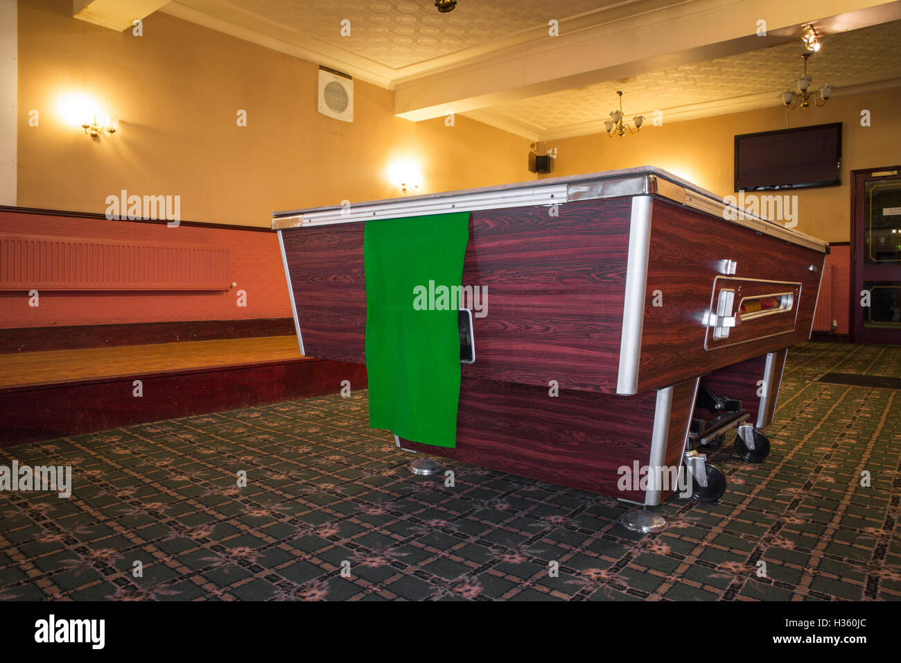 Interior fixtures and fittings of an old club house with dated worn ...