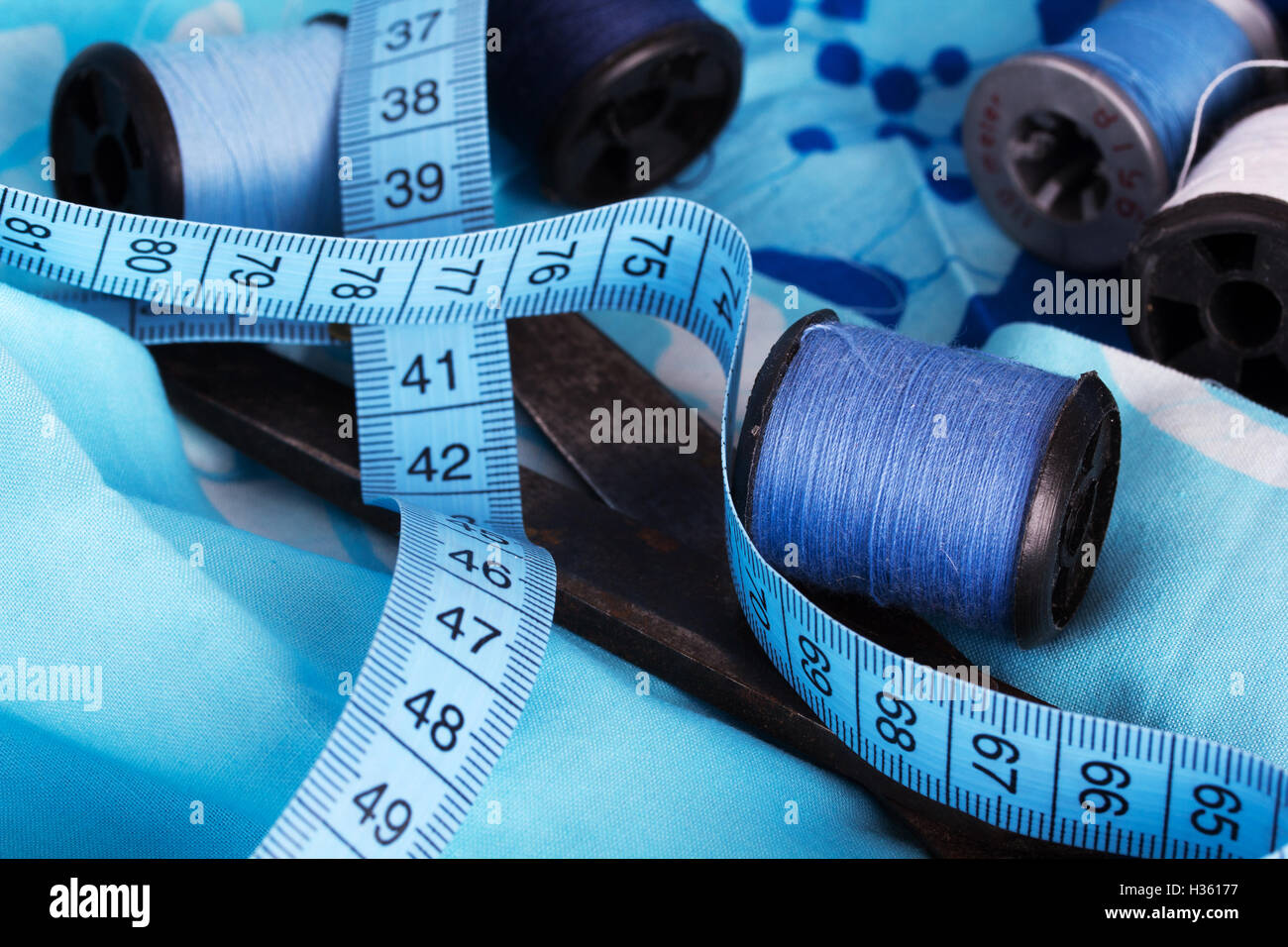 Various sewing equipment in shades of blue Stock Photo - Alamy