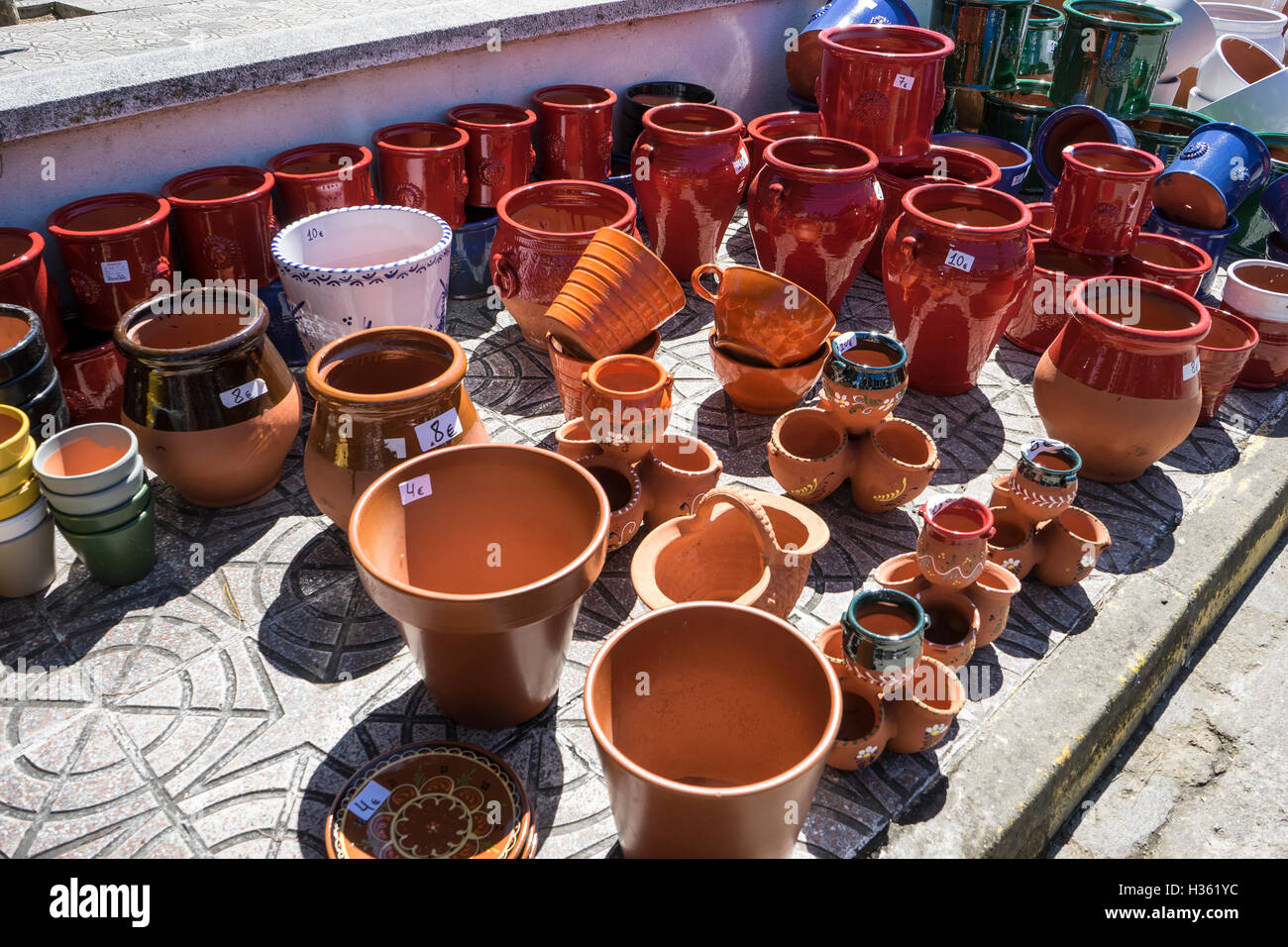 mud vessel handmade in a traditional medieval shop, crafts in Spain ...
