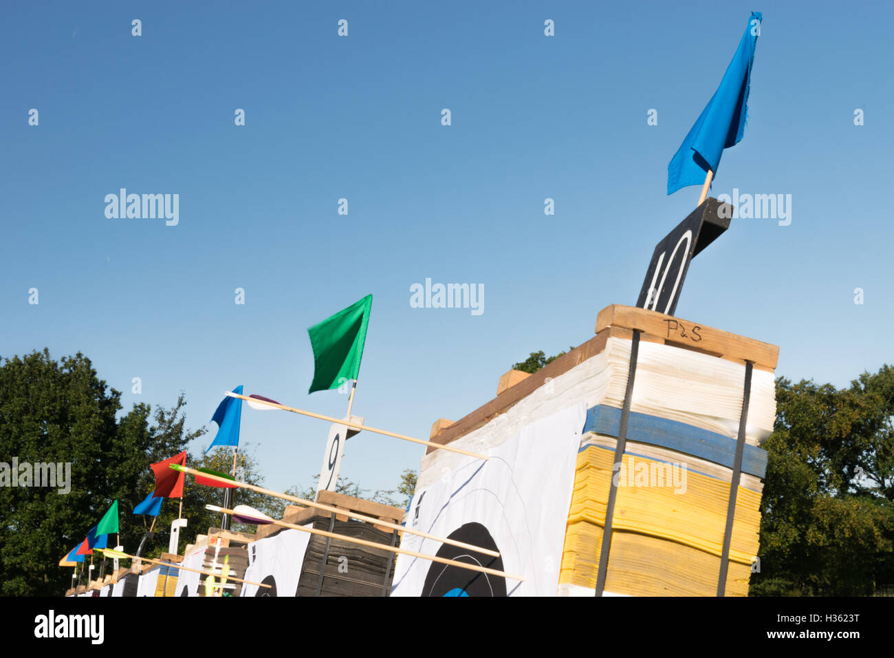 Flags on archery targets at a competition Stock Photo - Alamy