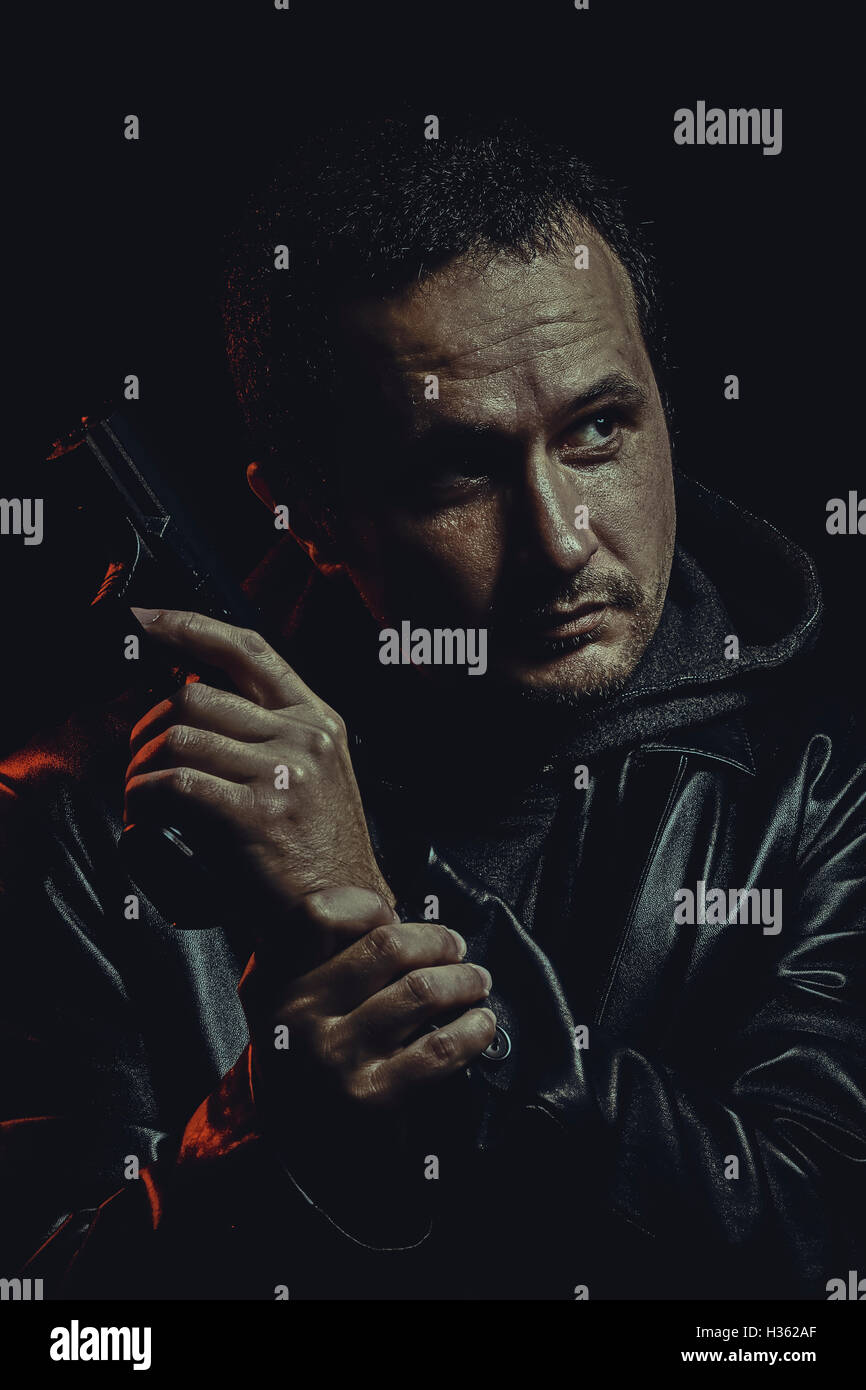 man with a gun ready to shoot Stock Photo - Alamy