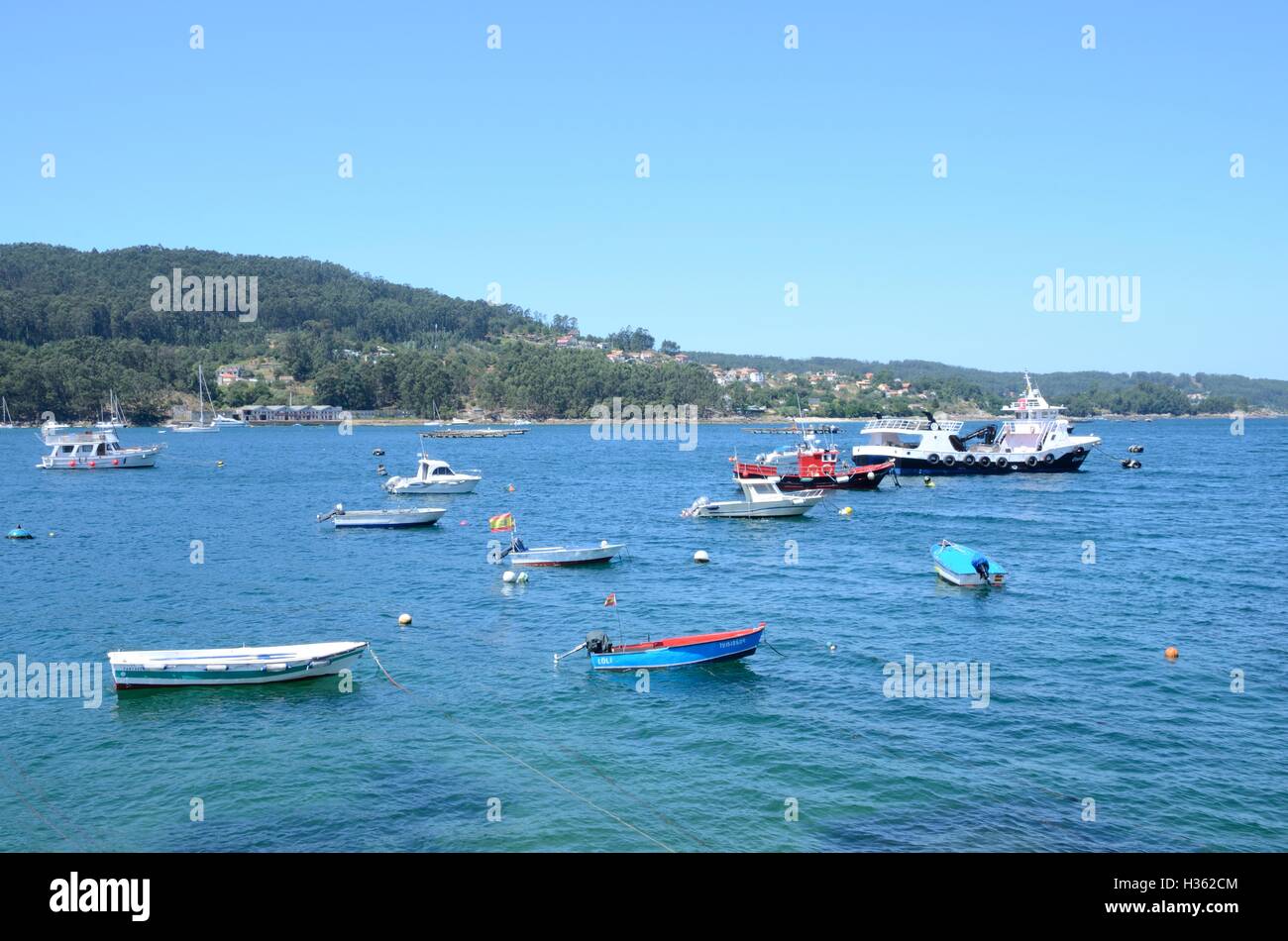 Boats in the fishing port of Aldan, in the province of Pontevedra ...