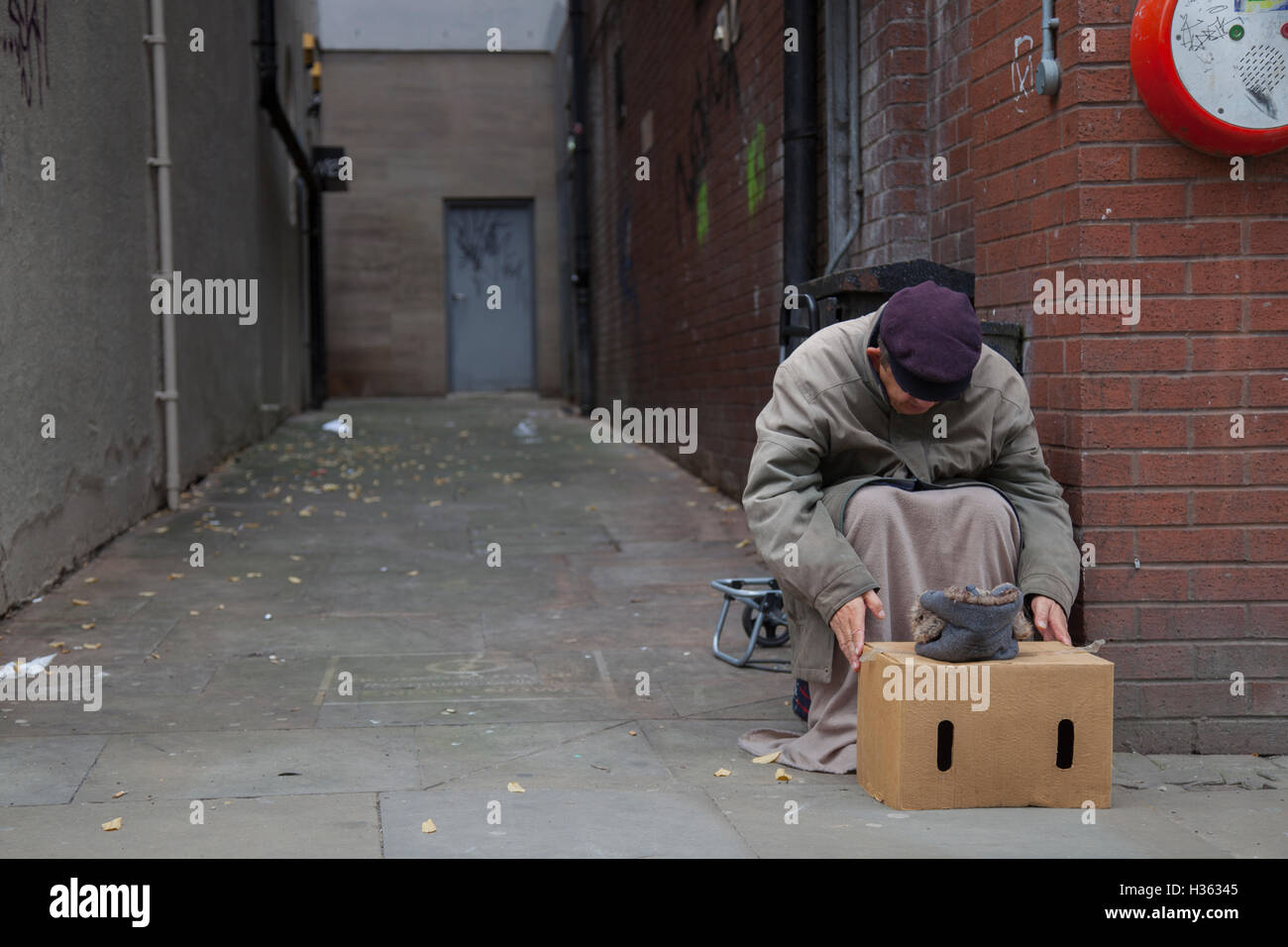 Homeless & homelessness & rough sleeper; living on the streets, doorway ...