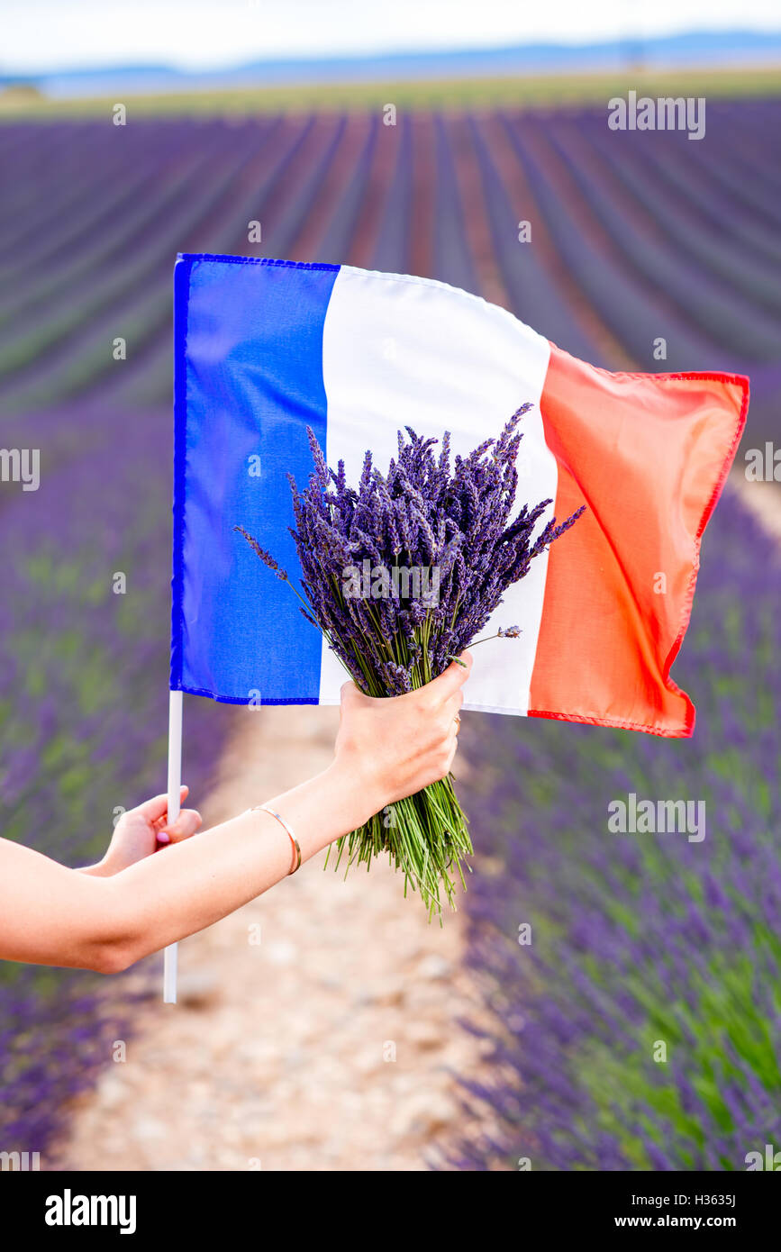 Bouquet with lavender and flag in the field Stock Photo - Alamy