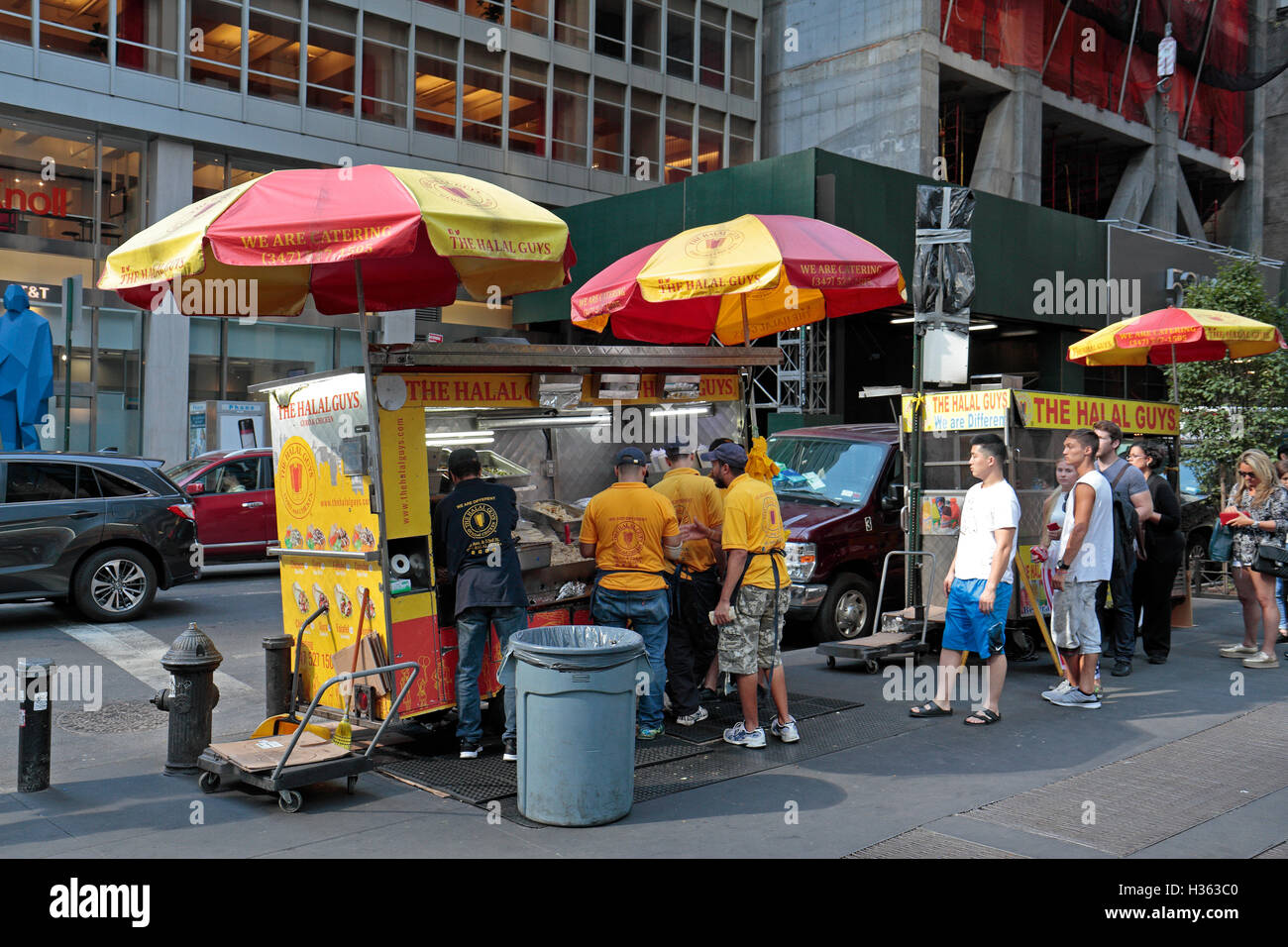A "The Halal Guys" gyro & chicken street stall in Manhattan, New York ...