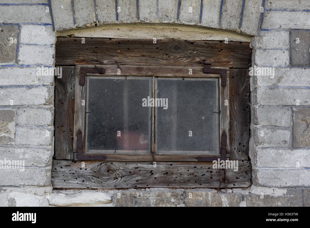 close up of very old window inside of white wall Stock Photo - Alamy