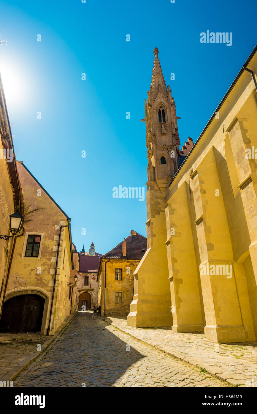 A street with traditional buildings in Bratislava, Slovakia Stock Photo ...