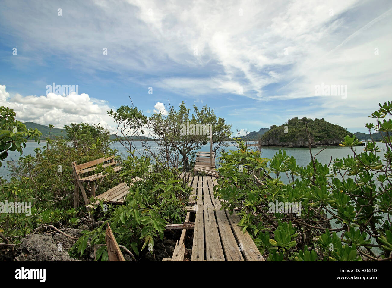 old wooden jetty on the shore with nice sky background Stock Photo - Alamy