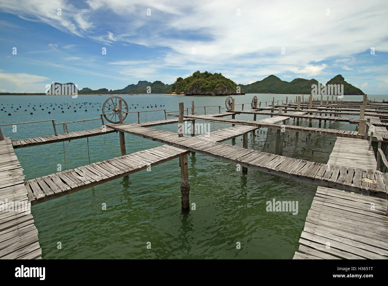 wooden jetty in the sea with beautiful sky background Stock Photo - Alamy