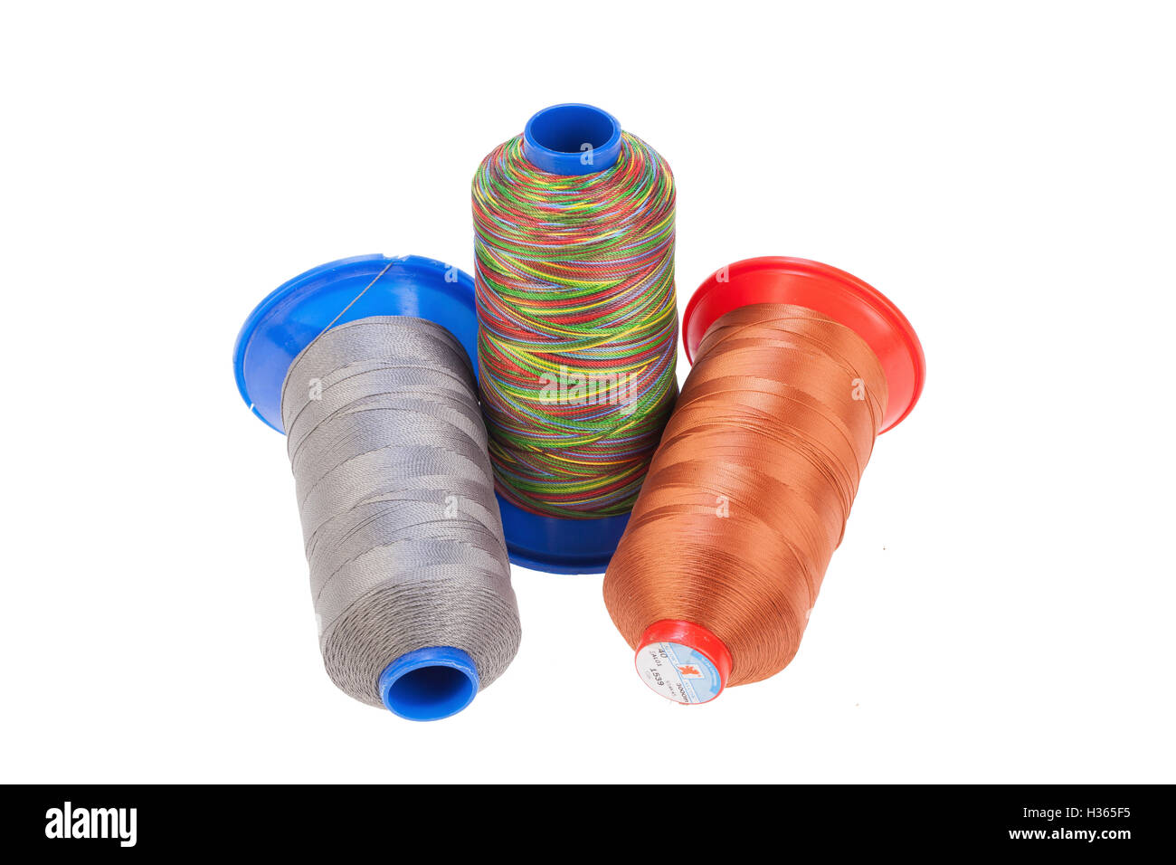 Bobbin with silk thread on an isolated studio background Stock Photo ...