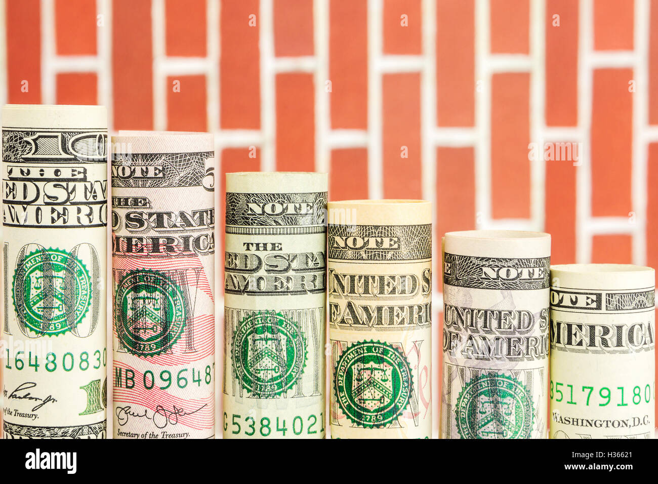 declining steps made of rolls of all american dollar banknotes in one ...