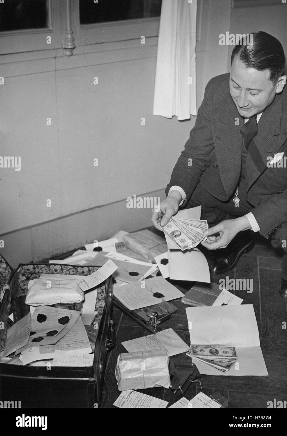 Confiscated money Black and White Stock Photos & Images - Alamy