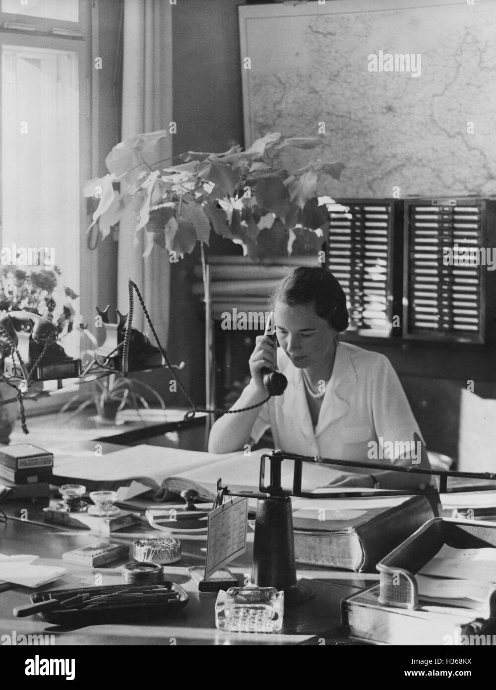 Secretary on the phone, 1938 Stock Photo - Alamy