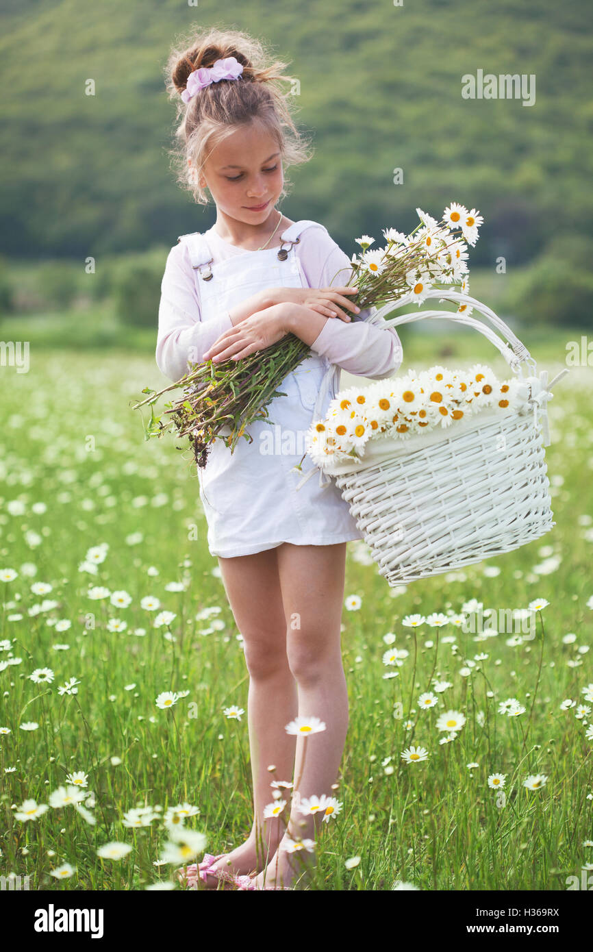 Child in field Stock Photo - Alamy