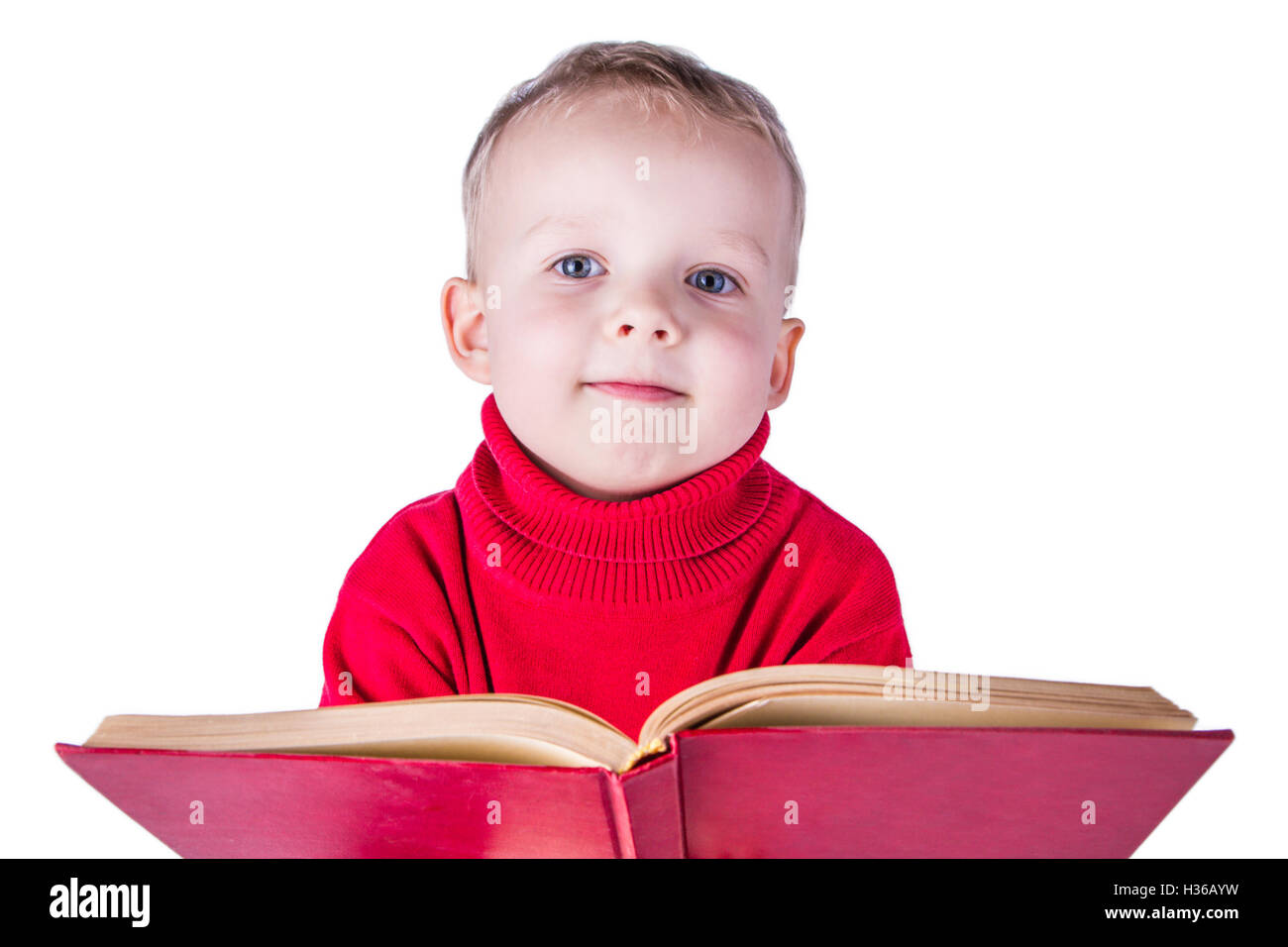 Boy reading a book Stock Photo - Alamy