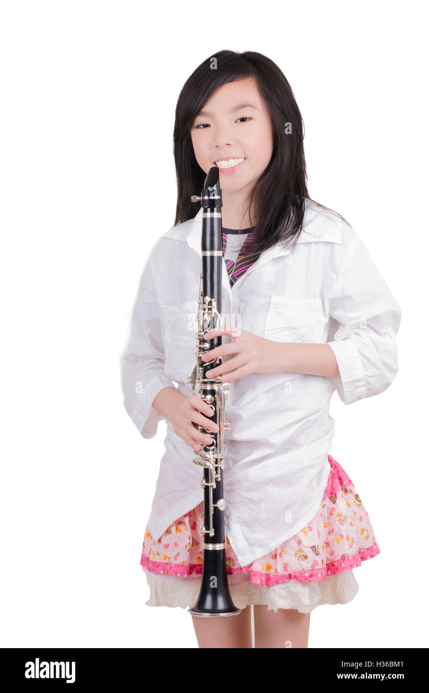 Beauty girl blowing instrument Stock Photo - Alamy