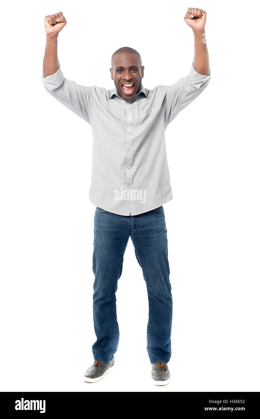 Happy man celebrating his success Stock Photo - Alamy