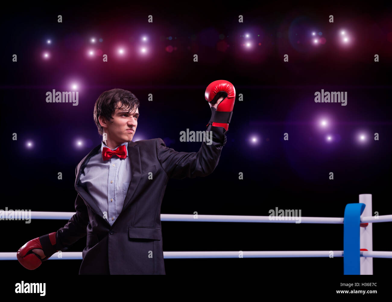 businessman with boxing gloves in the ring Stock Photo - Alamy