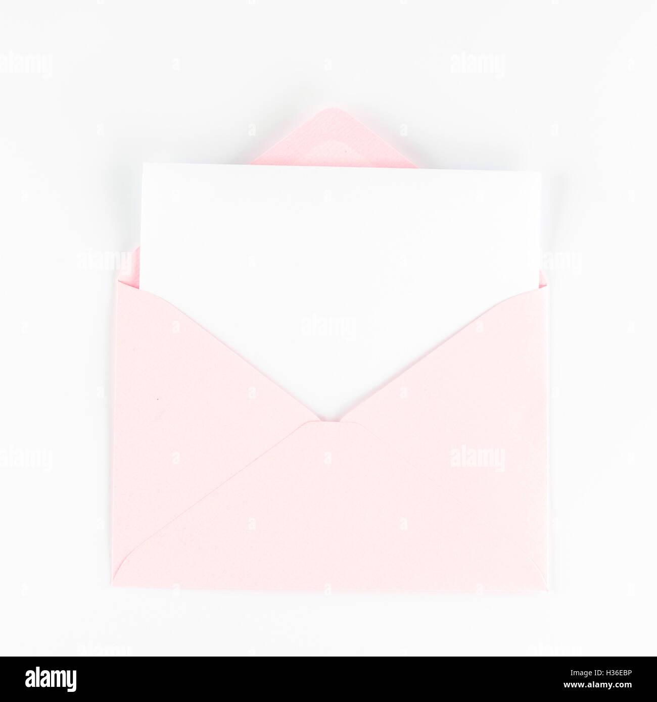 open envelope with white paper Stock Photo - Alamy