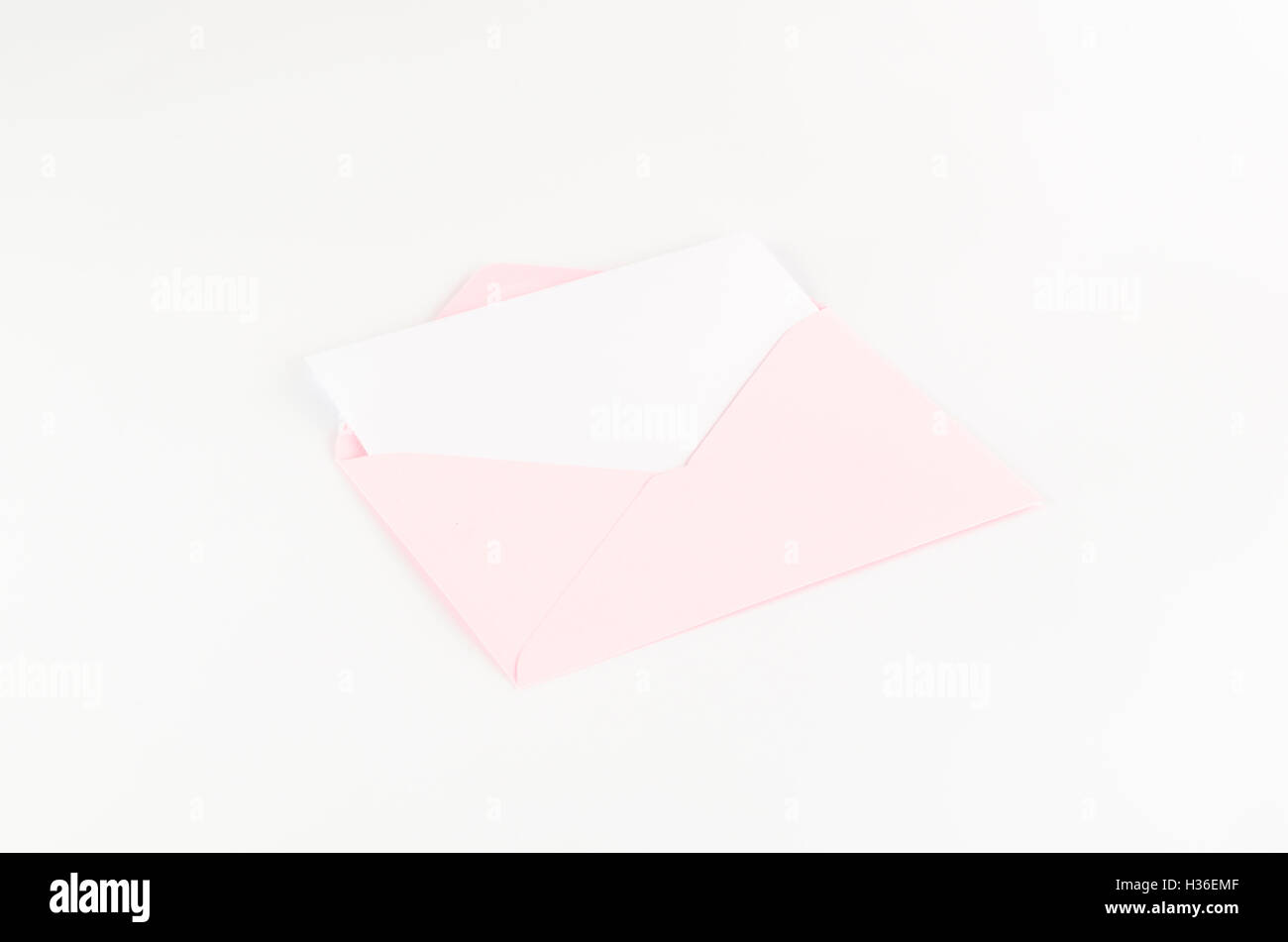 open envelope with white paper Stock Photo - Alamy