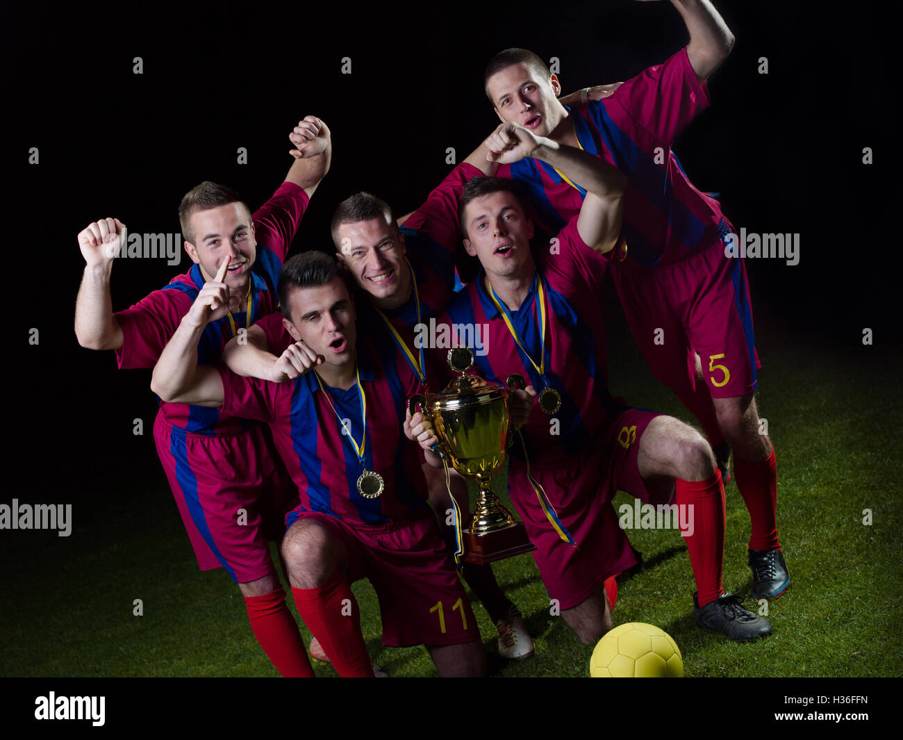 soccer players celebrating victory Stock Photo - Alamy