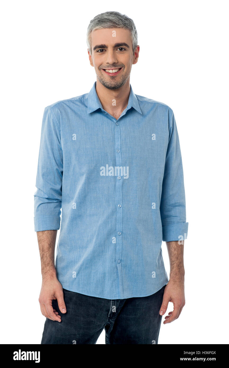 Relaxed young man posing casually Stock Photo - Alamy