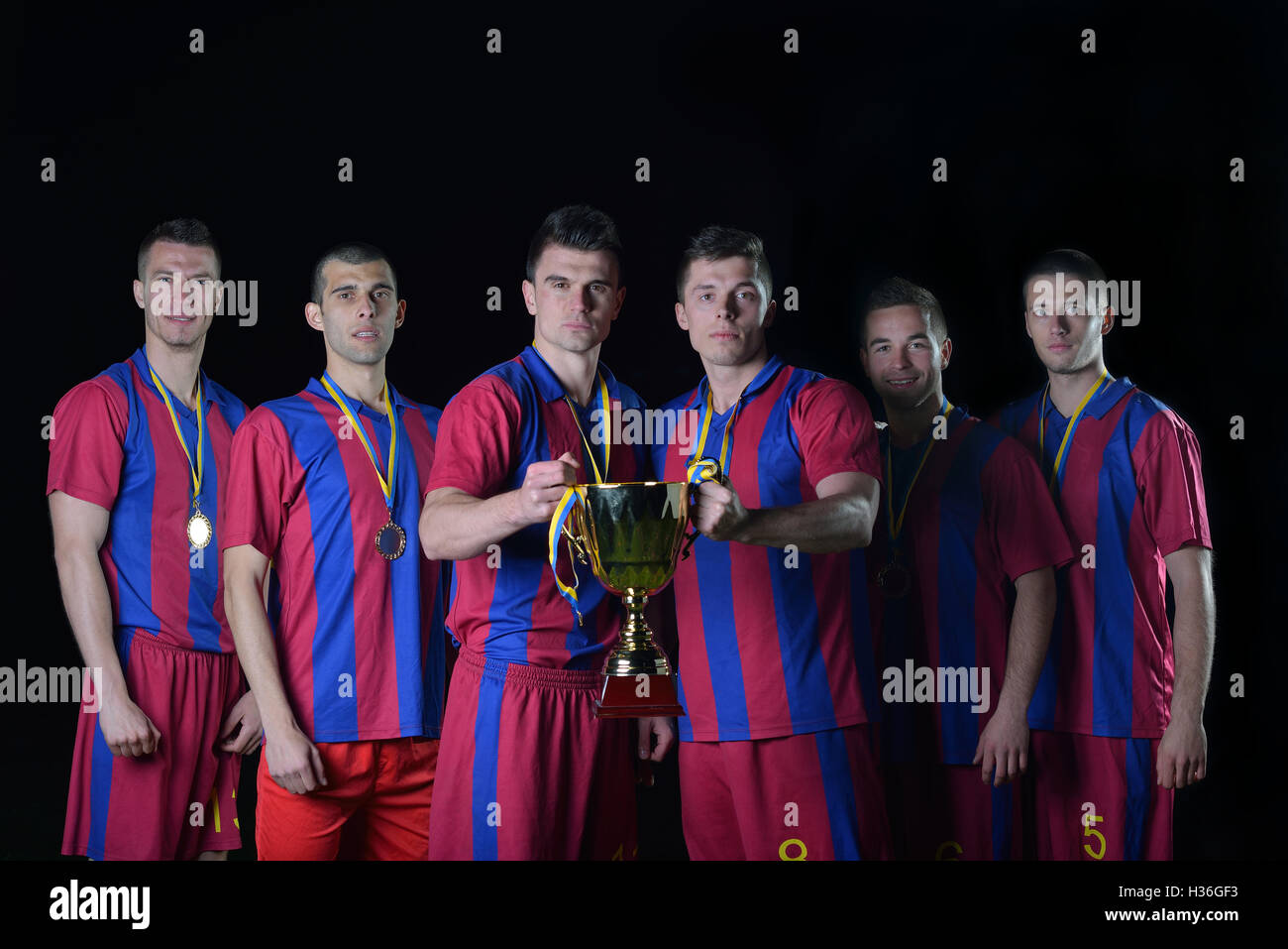 soccer players celebrating victory Stock Photo - Alamy