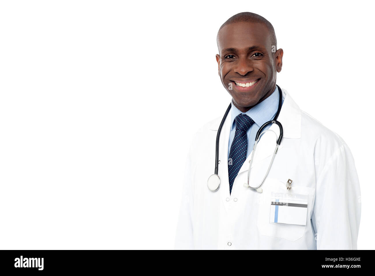 Smiling african male doctor posing Stock Photo - Alamy