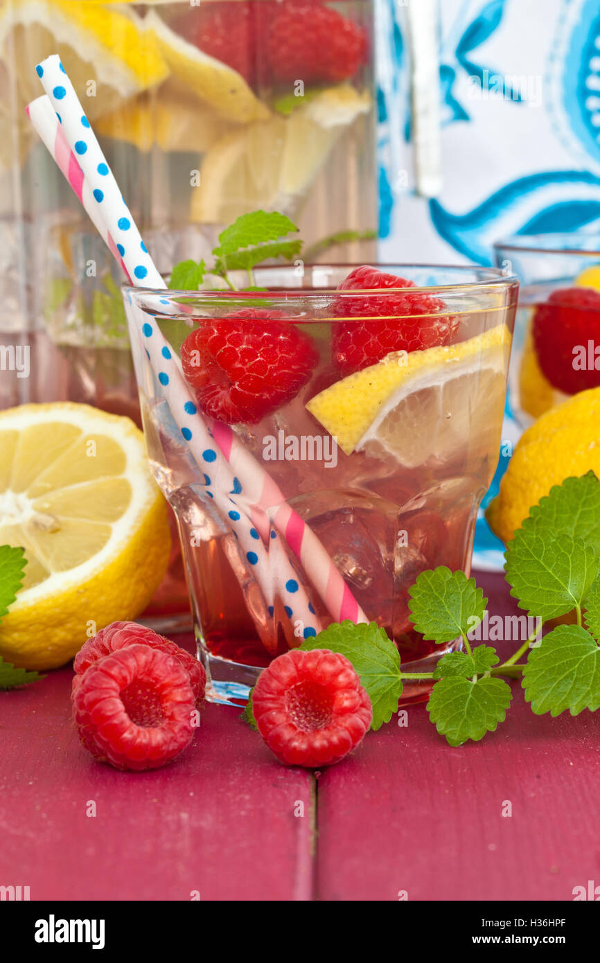Homemade lemonade with raspberries Stock Photo - Alamy